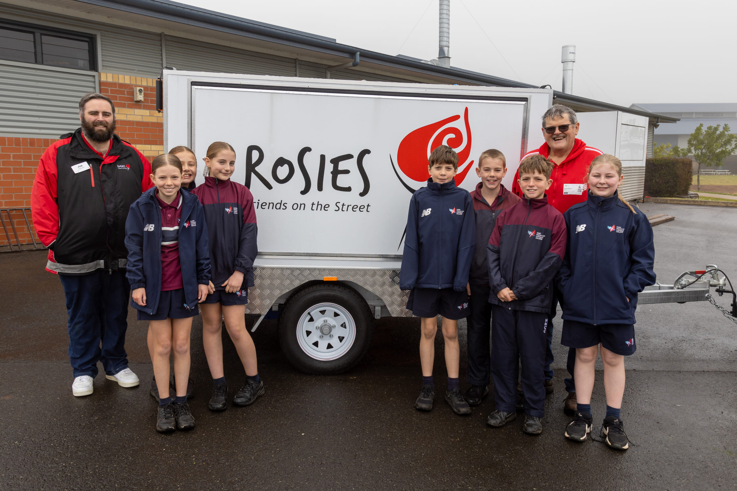 Rosies volunteers Joe Roberson and Russell Mauch with representatives ...